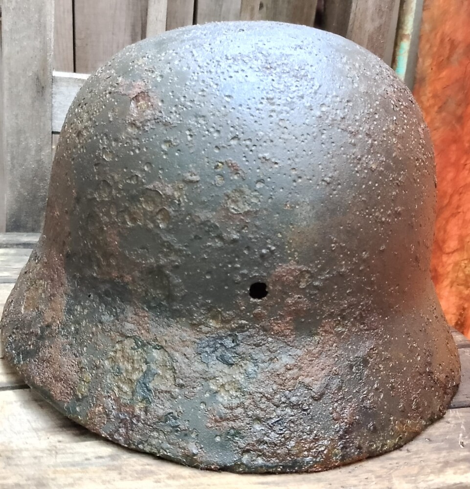 Wehrmacht helmet dug up from Novgorod battle Russia