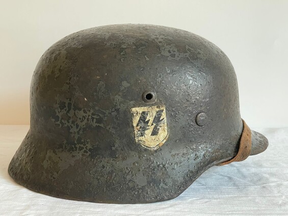 Waffen SS helmet M35 / from Demyansk pocket (town Staraya Russa)